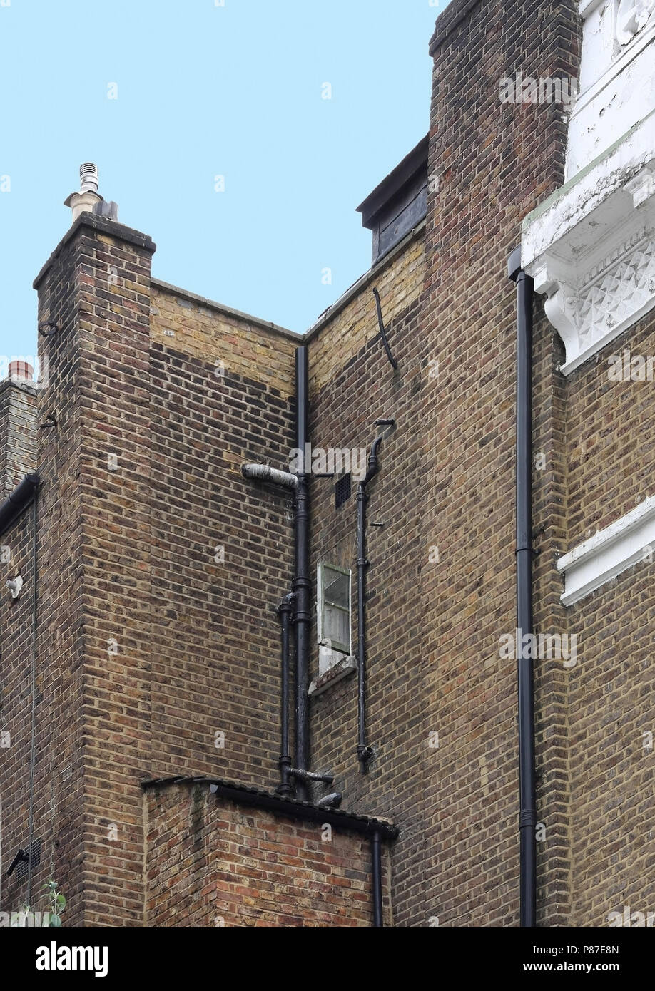 Old building with retro brick wall facade wall Stock Photo - Alamy