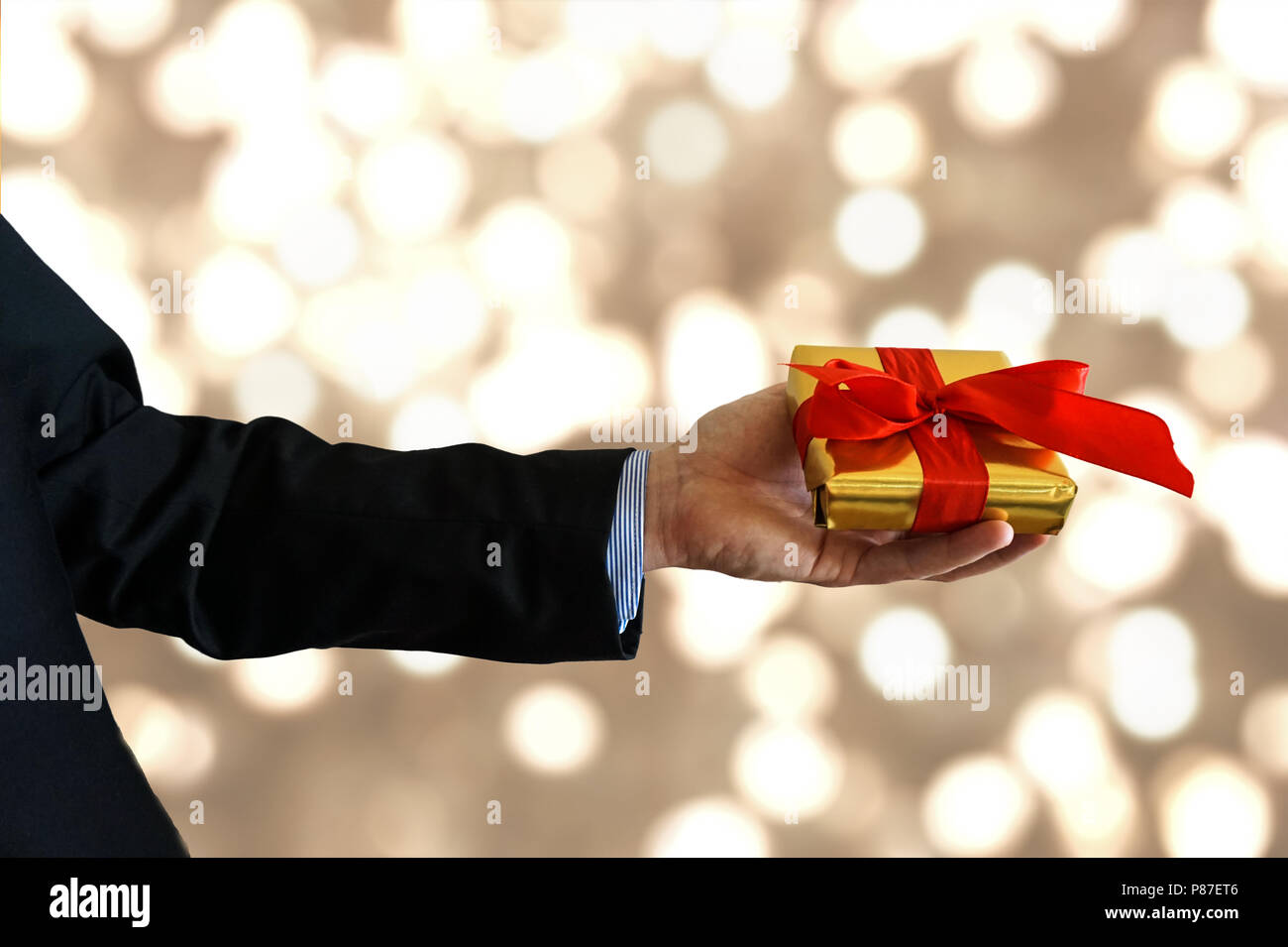Man giving present birthday party hi-res stock photography and images ...