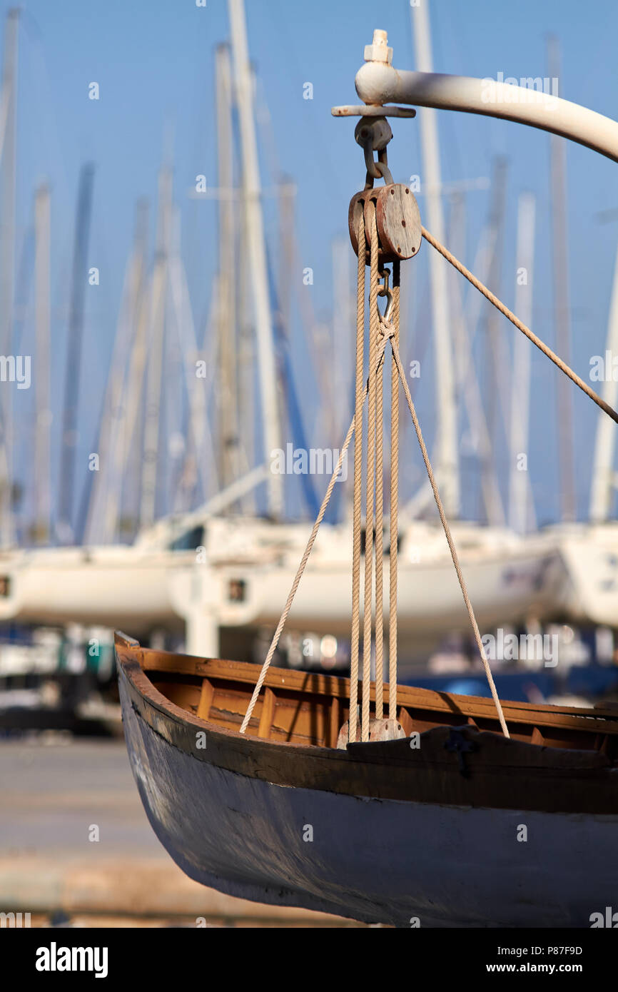 Small boats hanging hi-res stock photography and images - Alamy
