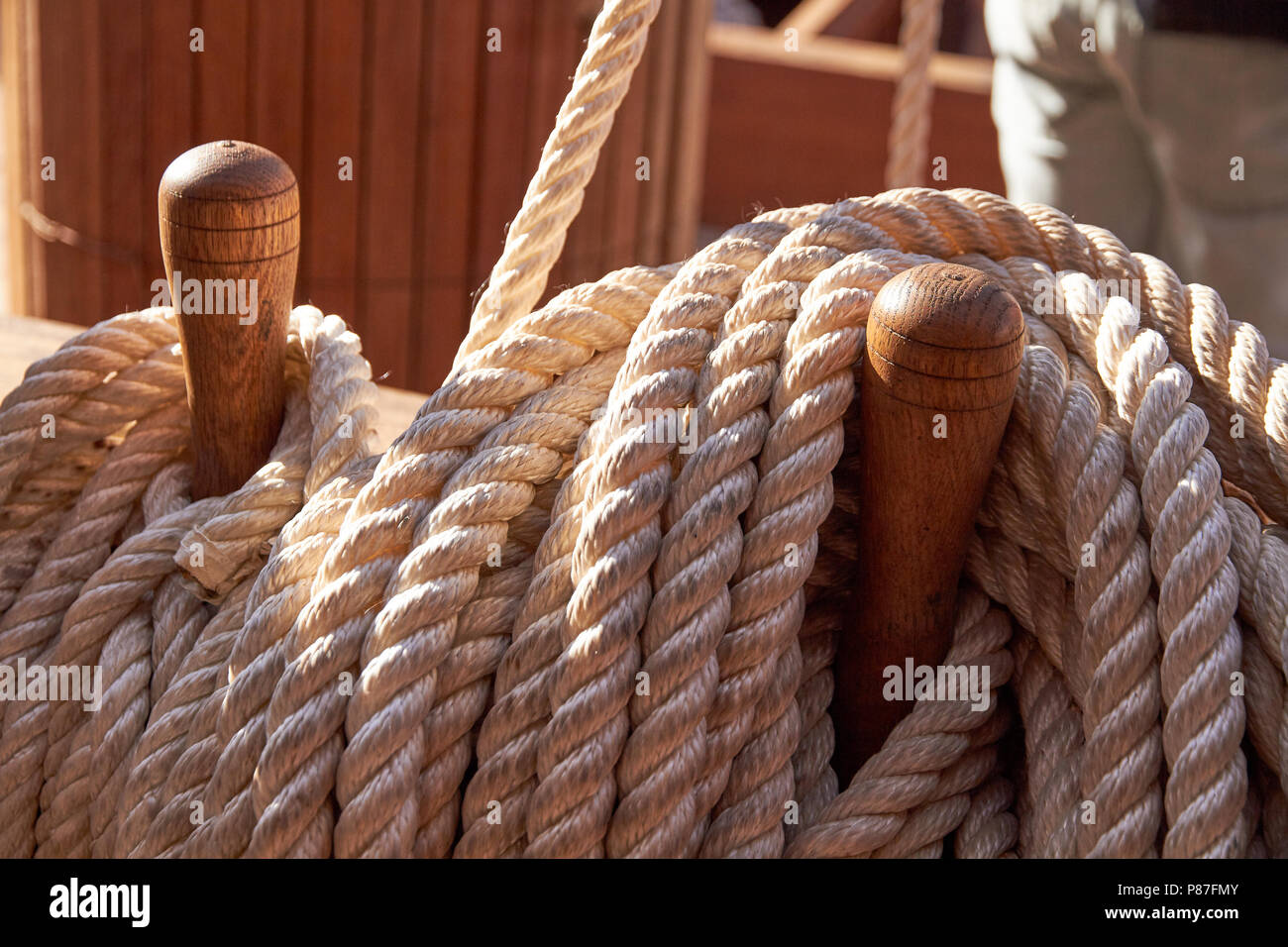 Marine background, sailing boat block with old rope Stock Photo - Alamy