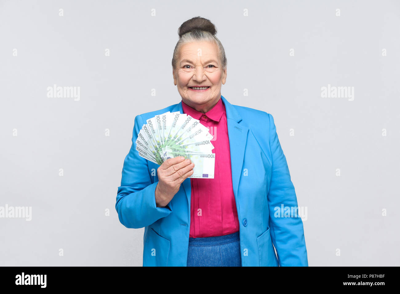 Grandma Holding Money High Resolution Stock Photography and Images - Alamy