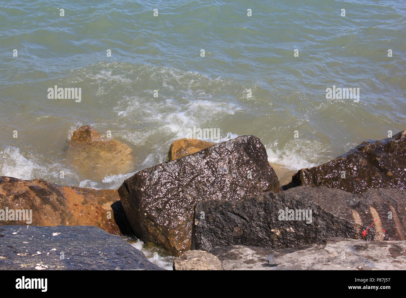 Broken rocks at the lakefront at Northwestern University Park on the ...