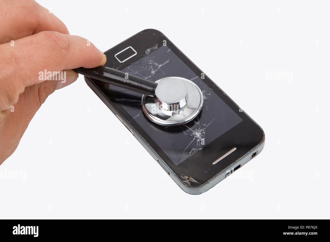 Broken phone display and sttoscope. Repairing damaged phone Stock Photo ...