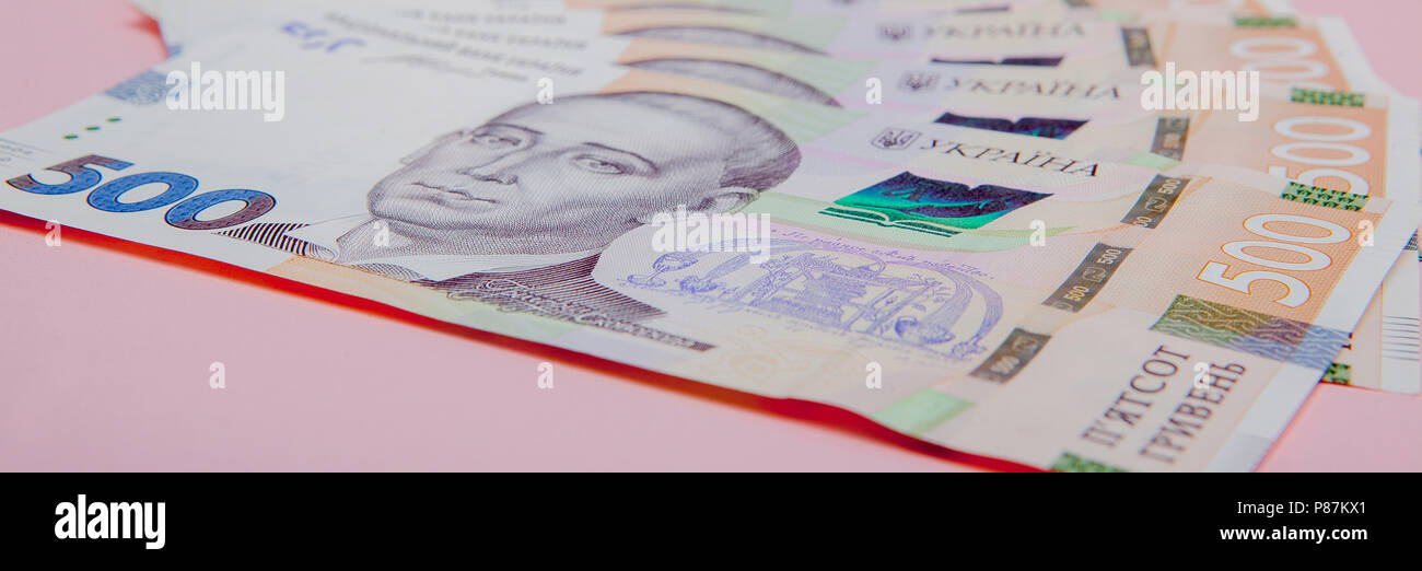 Modern Ukrainian money on pink background - hryvnia . 500 banknotes ...