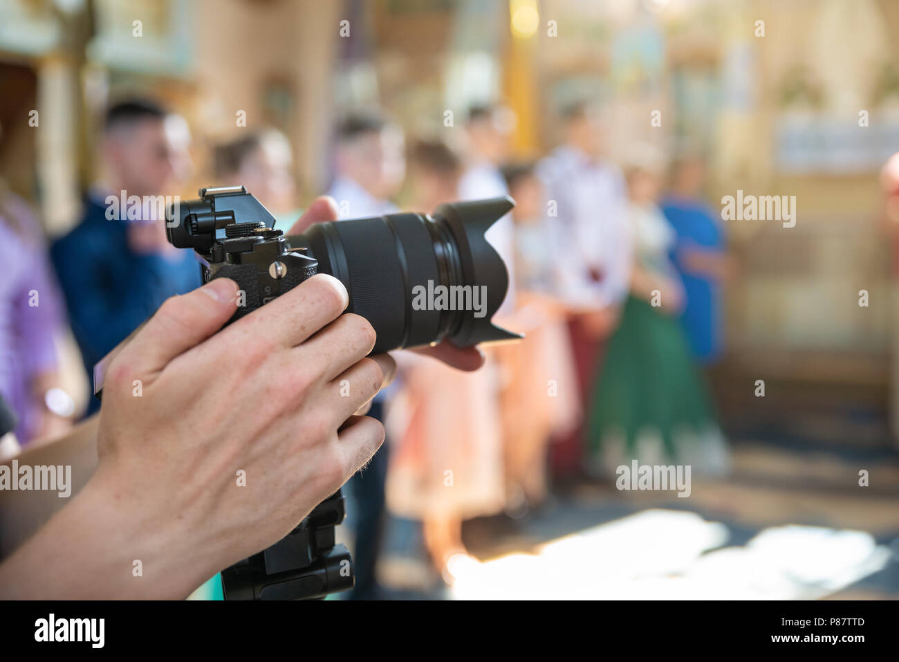 Videographer at work, filming ceremonial events and celebrations Stock ...