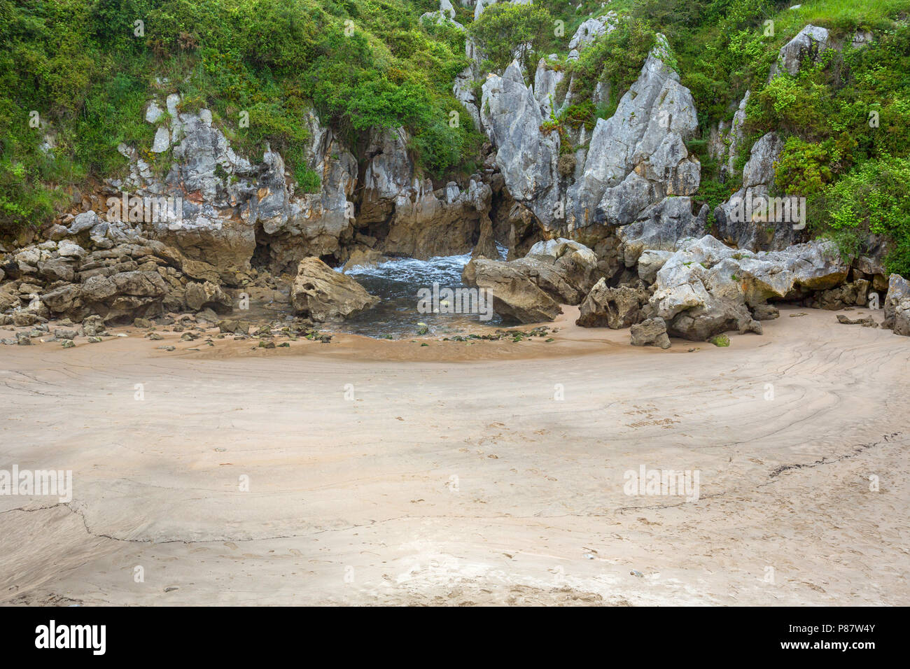 the famous beach gulpiyuri, in Asturias, Spain Stock Photo - Alamy