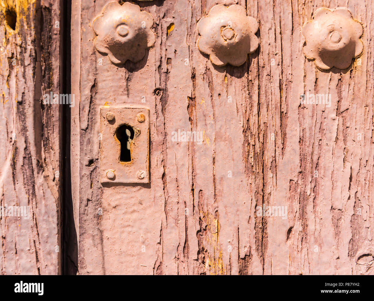 close up on the old lock with an interesting texture on the door, home ...