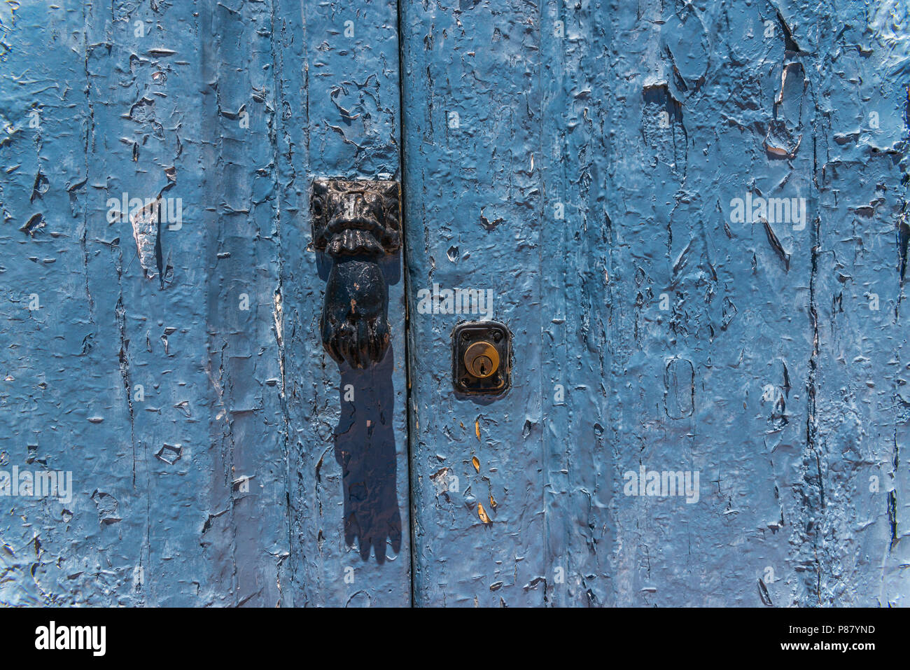 close up on the old lock with an interesting texture on the door, home ...