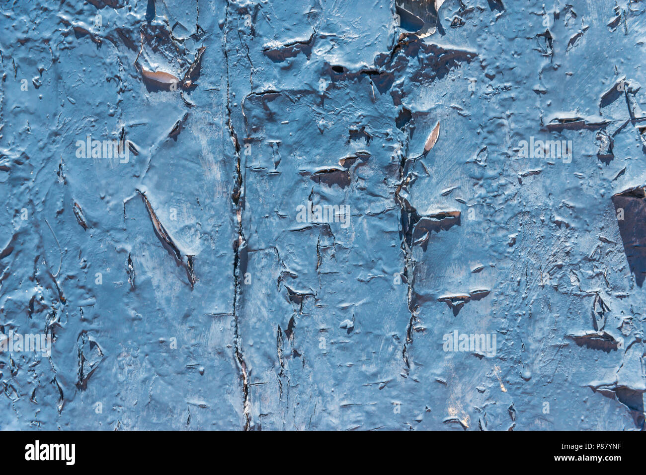 Old flaky paint peeling off on old wall, cracks and scrapes on the ...