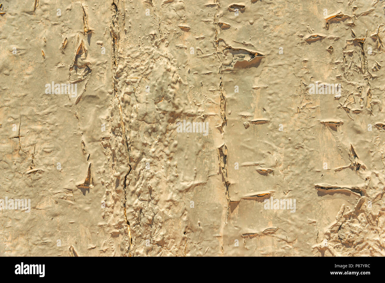 Old flaky paint peeling off on old wall, cracks and scrapes on the ...