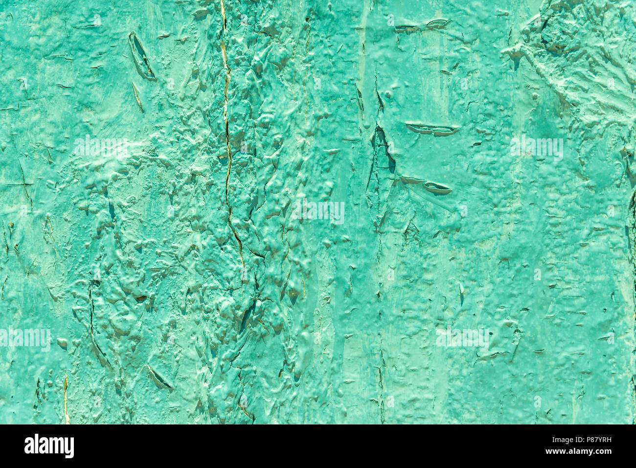 Old flaky paint peeling off on old wall, cracks and scrapes on the ...