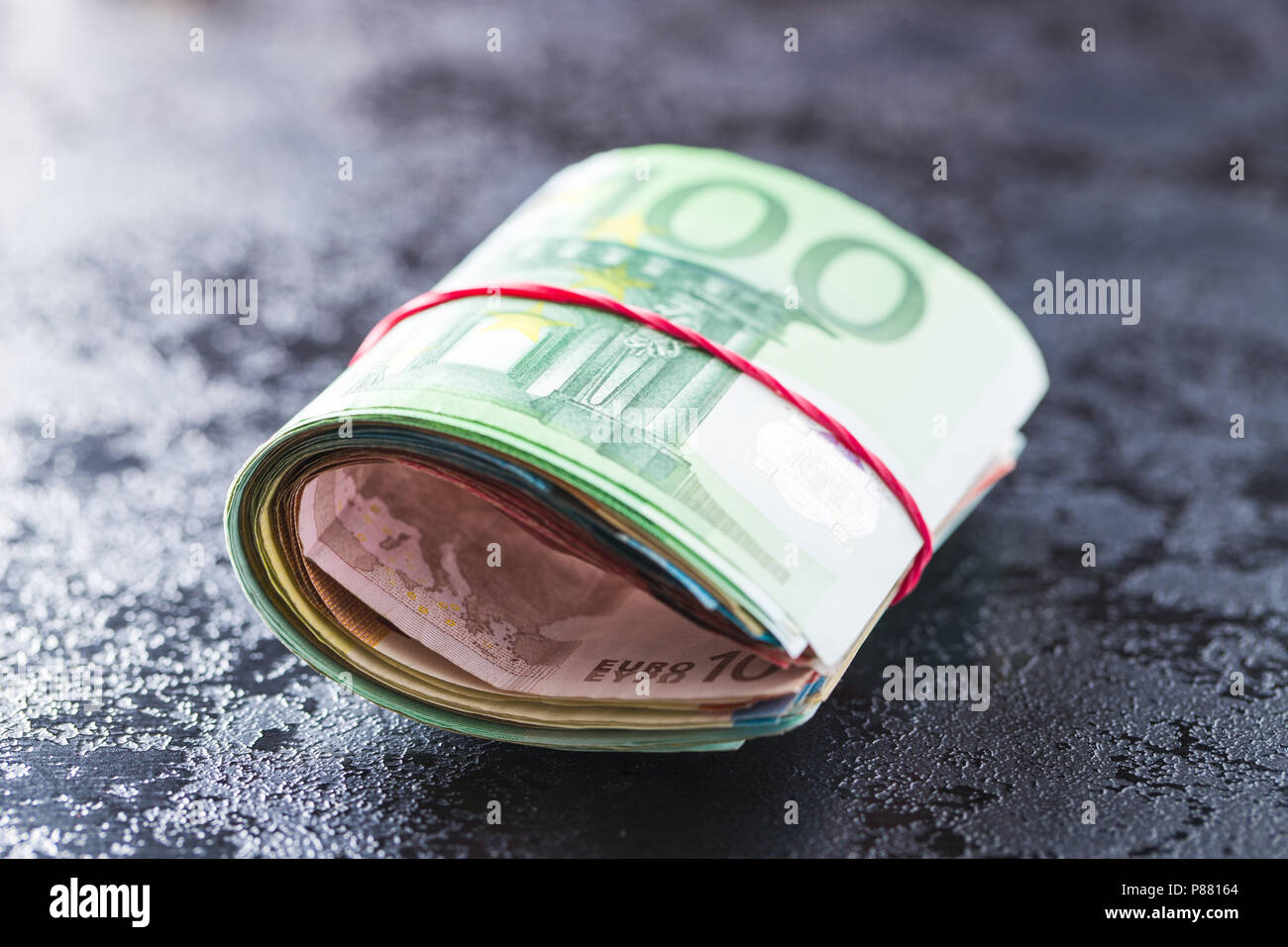 Euro coin roll hi-res stock photography and images - Alamy