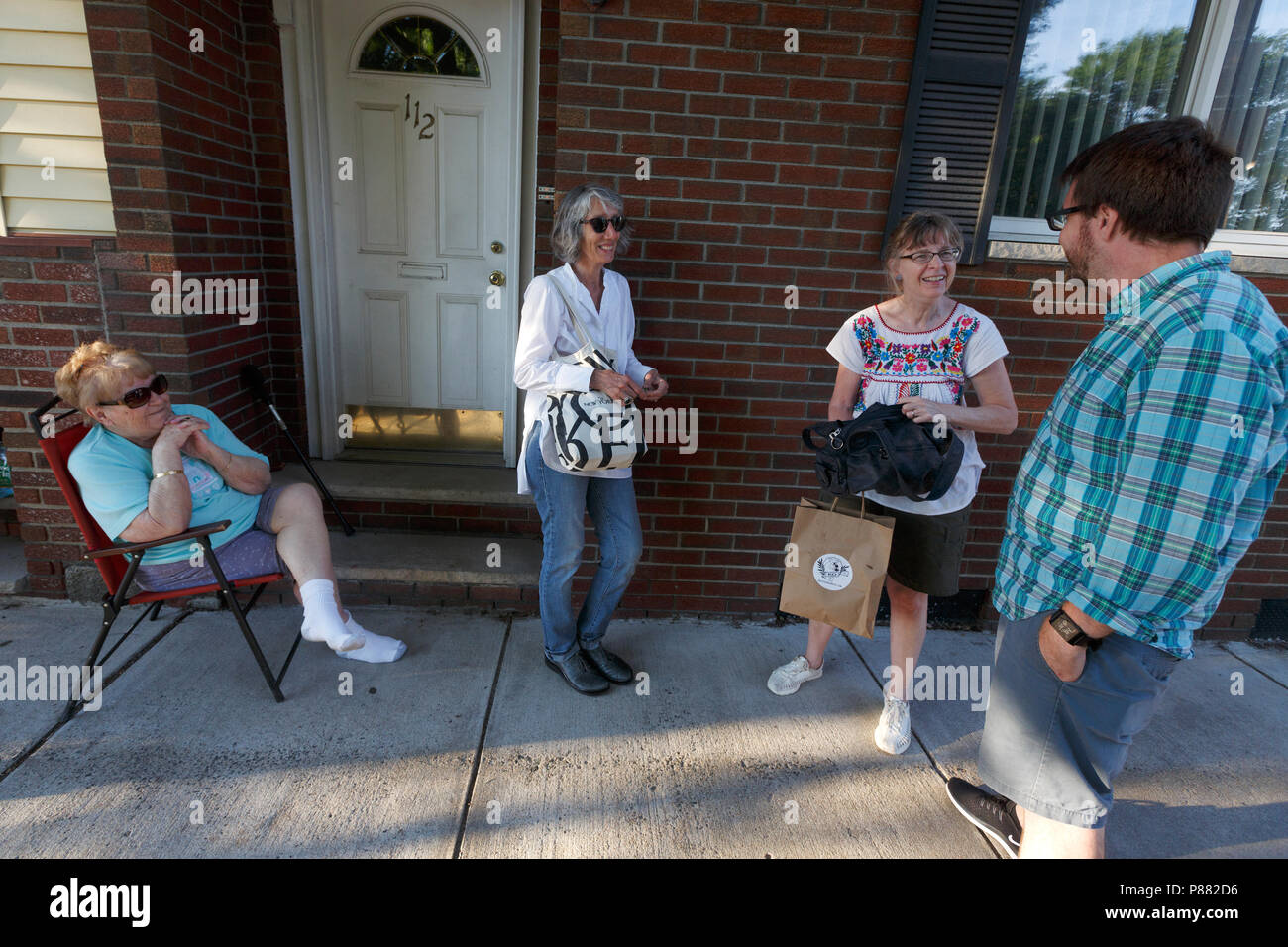Neighbors Talking High Resolution Stock Photography and Images - Alamy