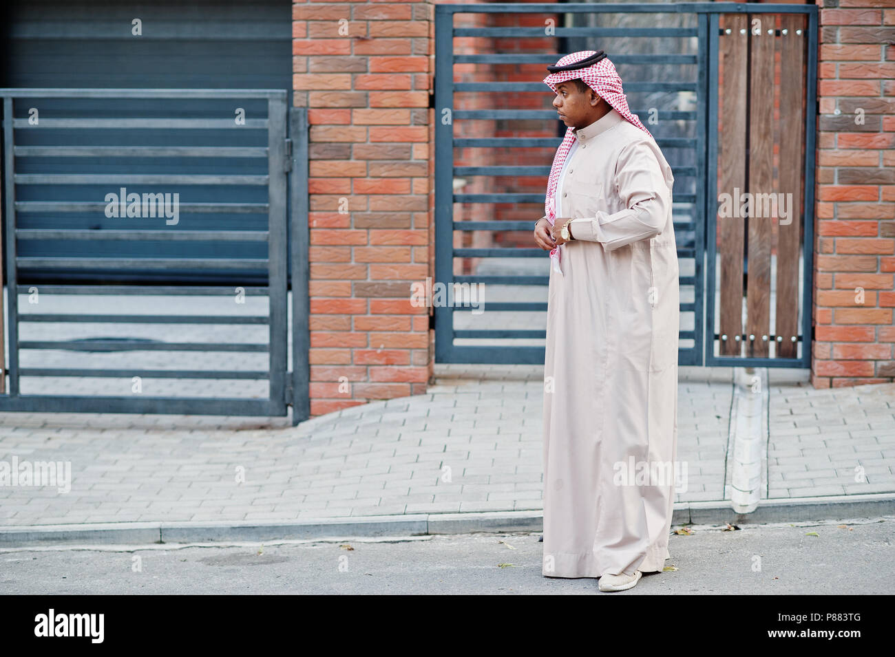 Middle Eastern arab man posed on street against modern building Stock ...