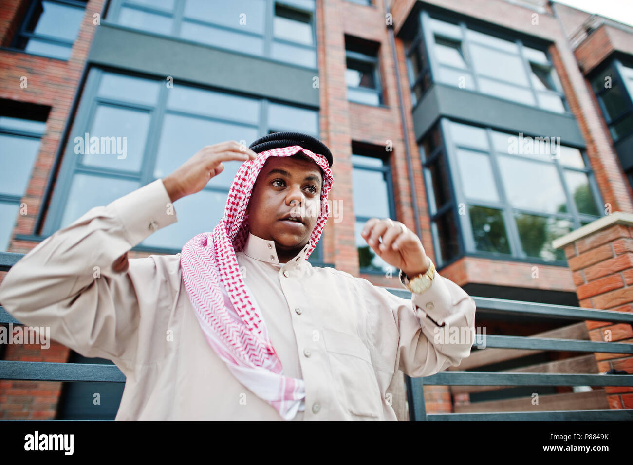 Middle Eastern arab man posed on street against modern building Stock ...
