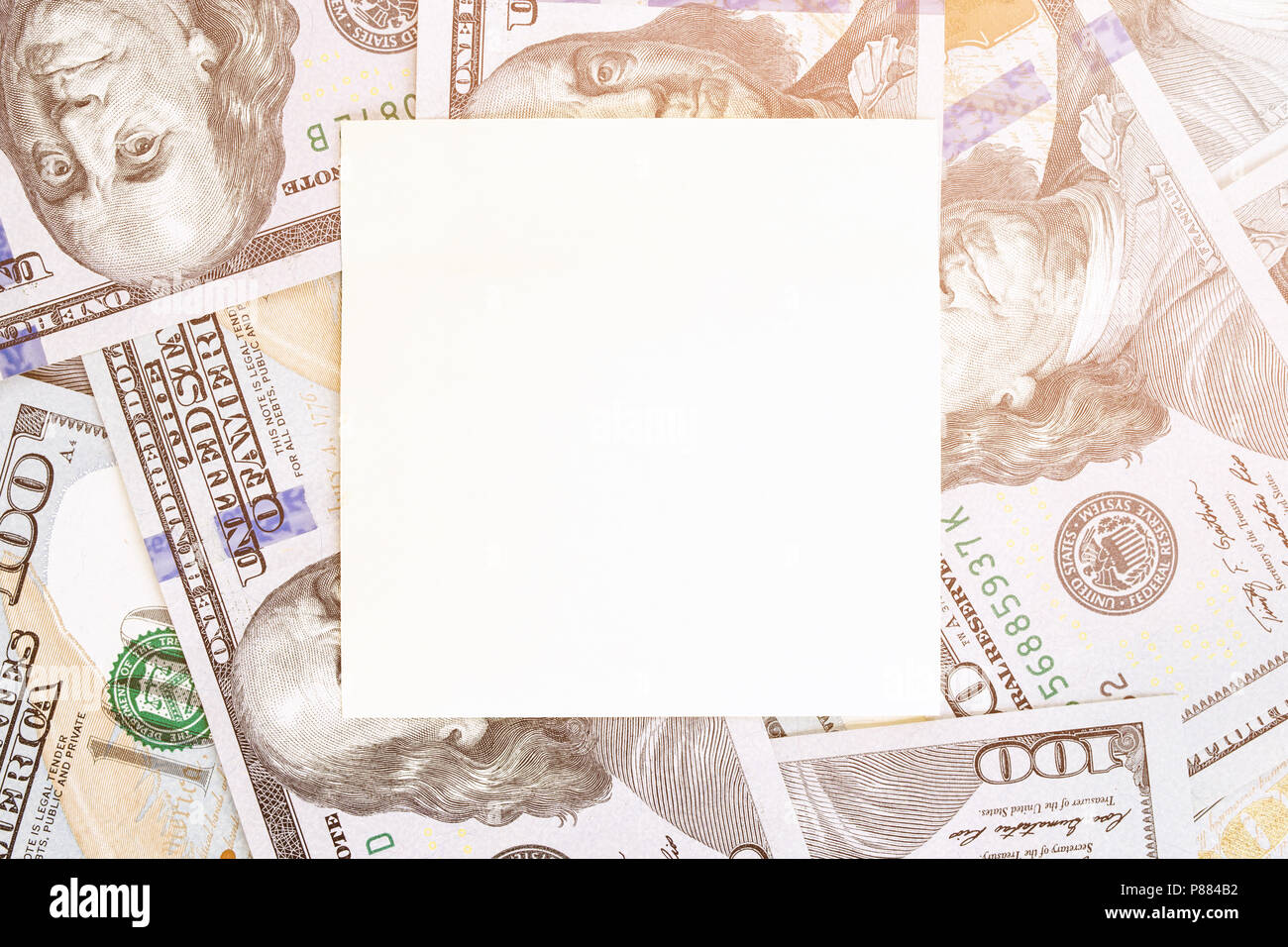 Money background with white paper square mockup. Copyspace place for ...