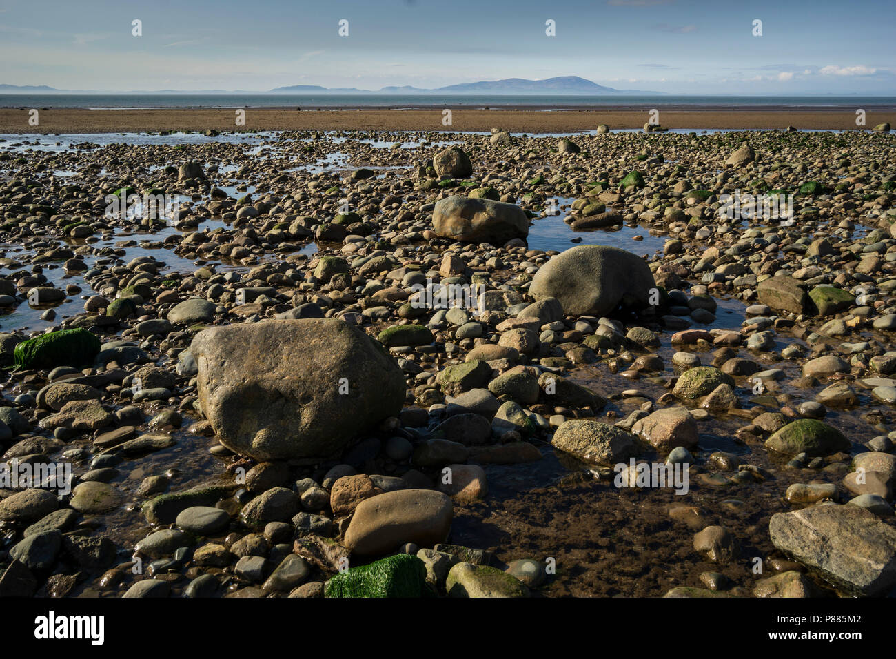The rocky beach near Cross Canonby on the Solway Firth of Cumbria, with ...