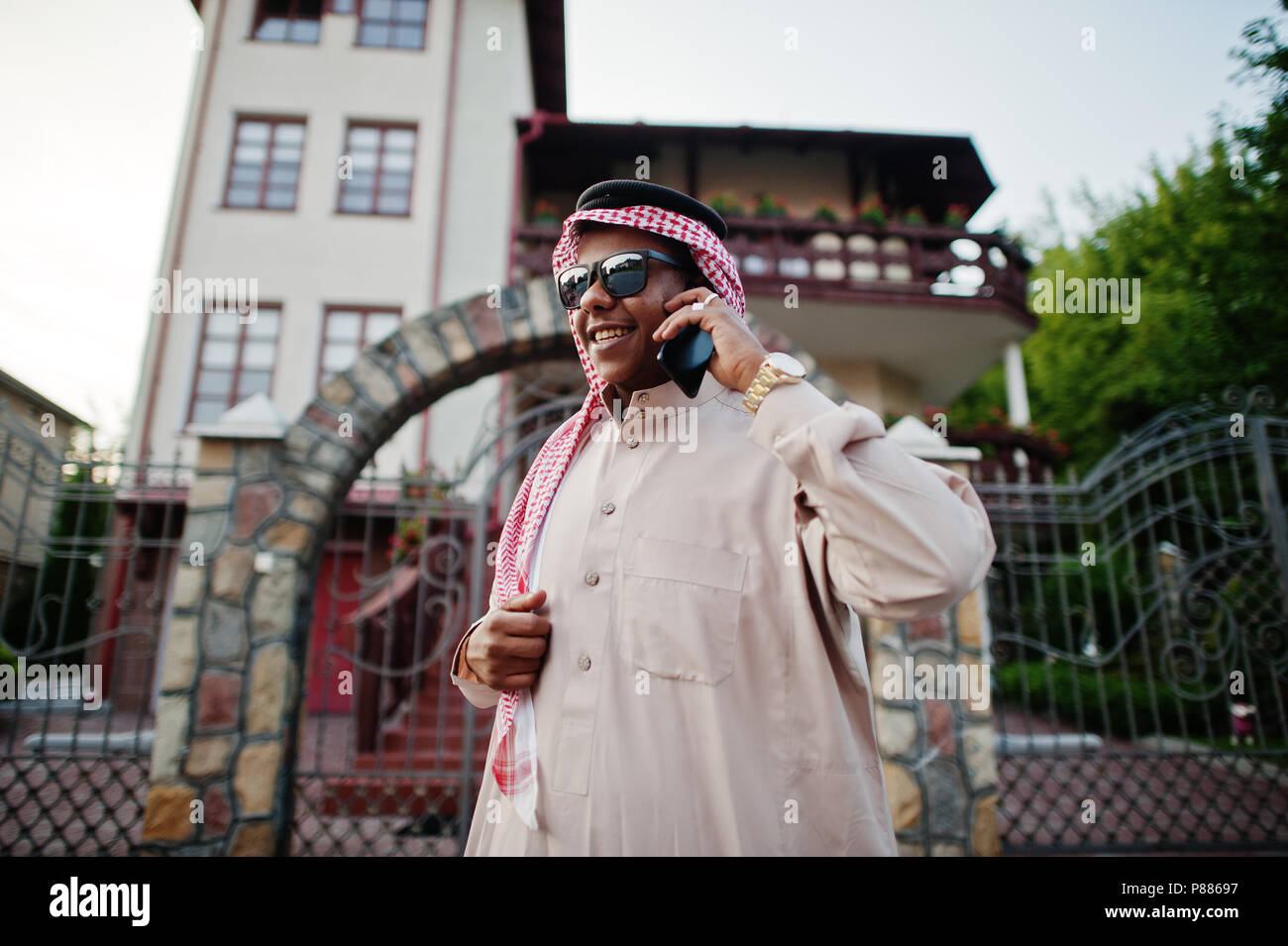 Rich Middle Eastern arab business man with sunglasses posed on street ...