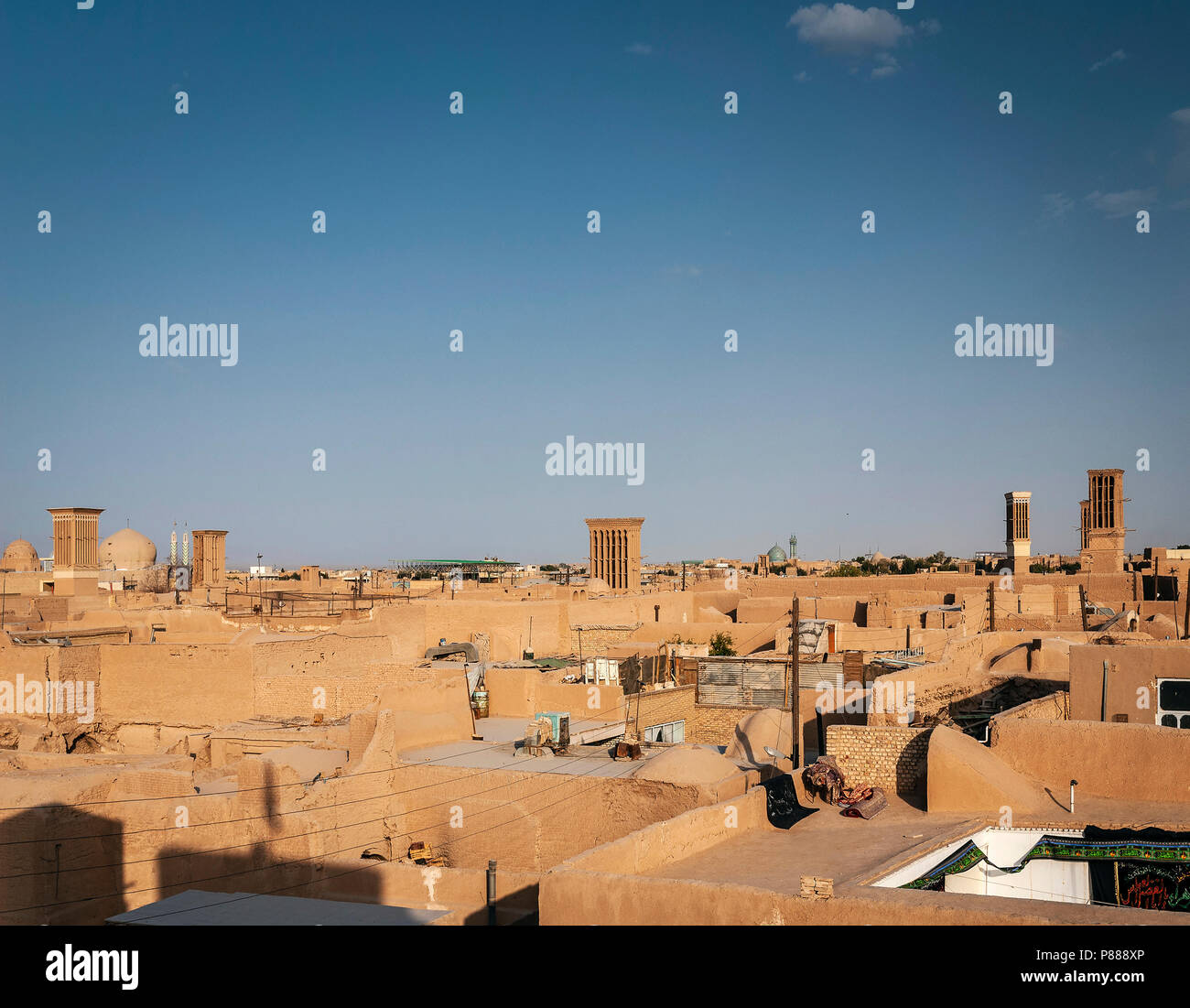 downtown rooftops wind towers and landscape view of yazd city old town ...