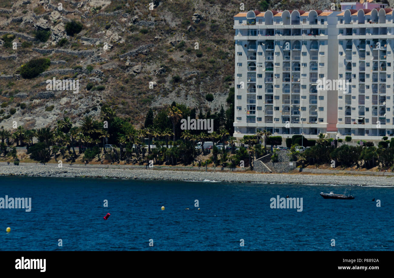 ALMUNECAR, SPAIN - JUNE 8, 2018 Landscape of the famous coastal town by ...