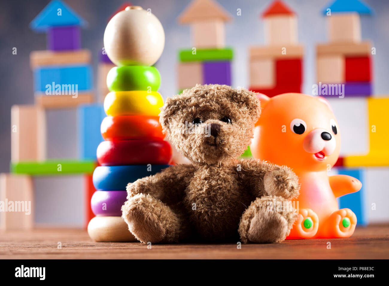 Cute teddy bear on wooden background Stock Photo - Alamy