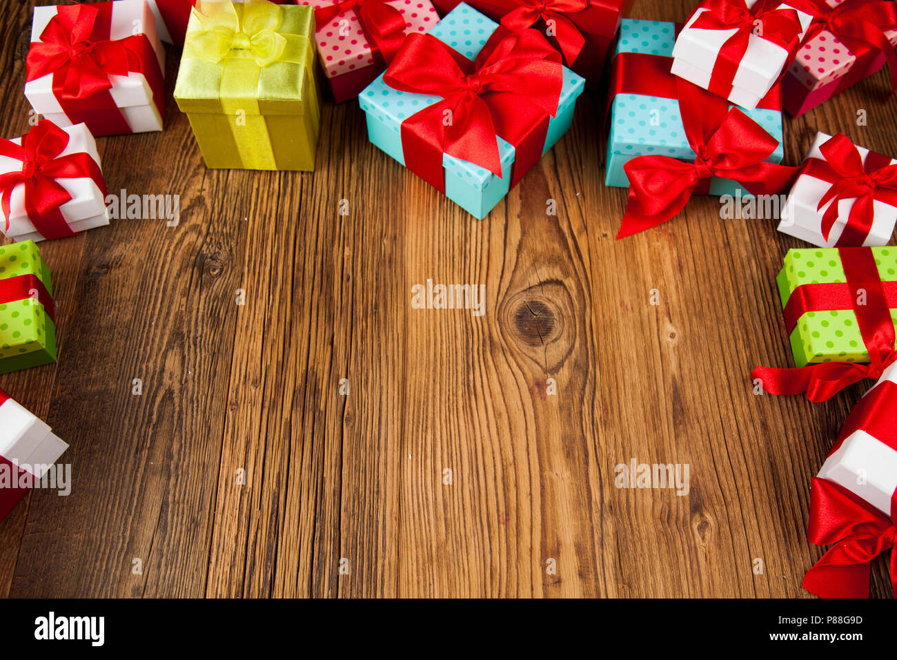 Christmas Frame, Gift box with red ribbon Stock Photo - Alamy
