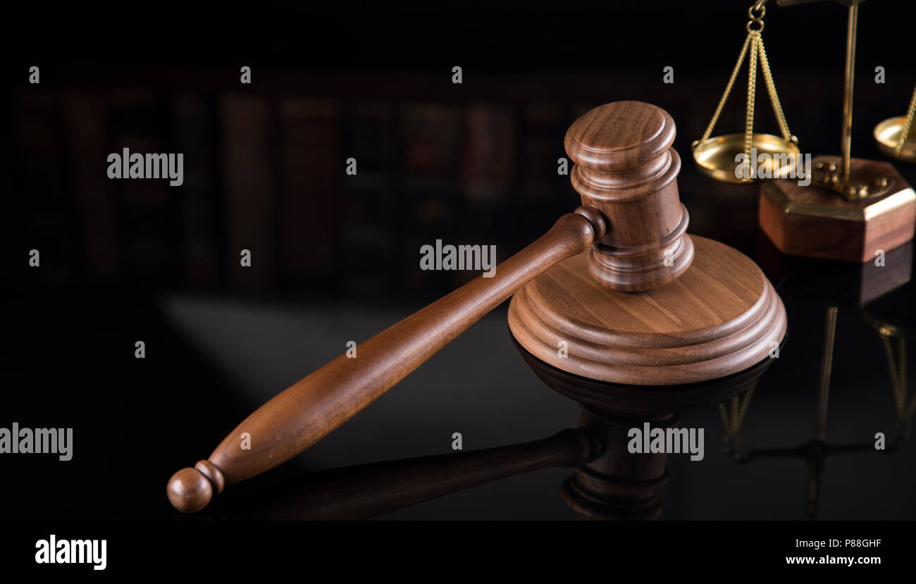 Law theme, mallet of the judge, justice scale, mirror reflection ...