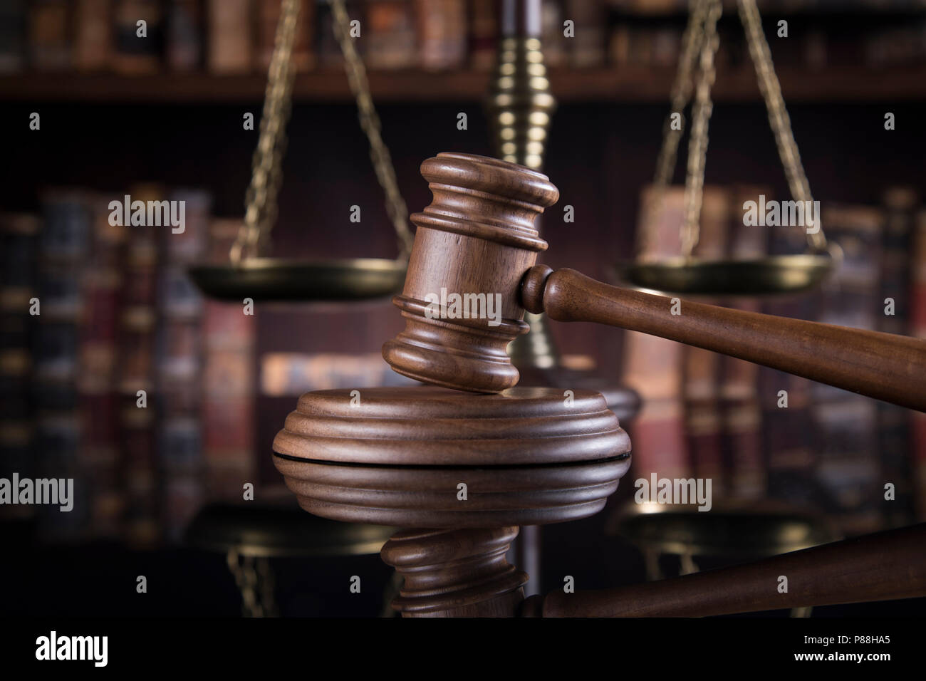 Law theme, mallet of the judge, justice scale, mirror reflection ...