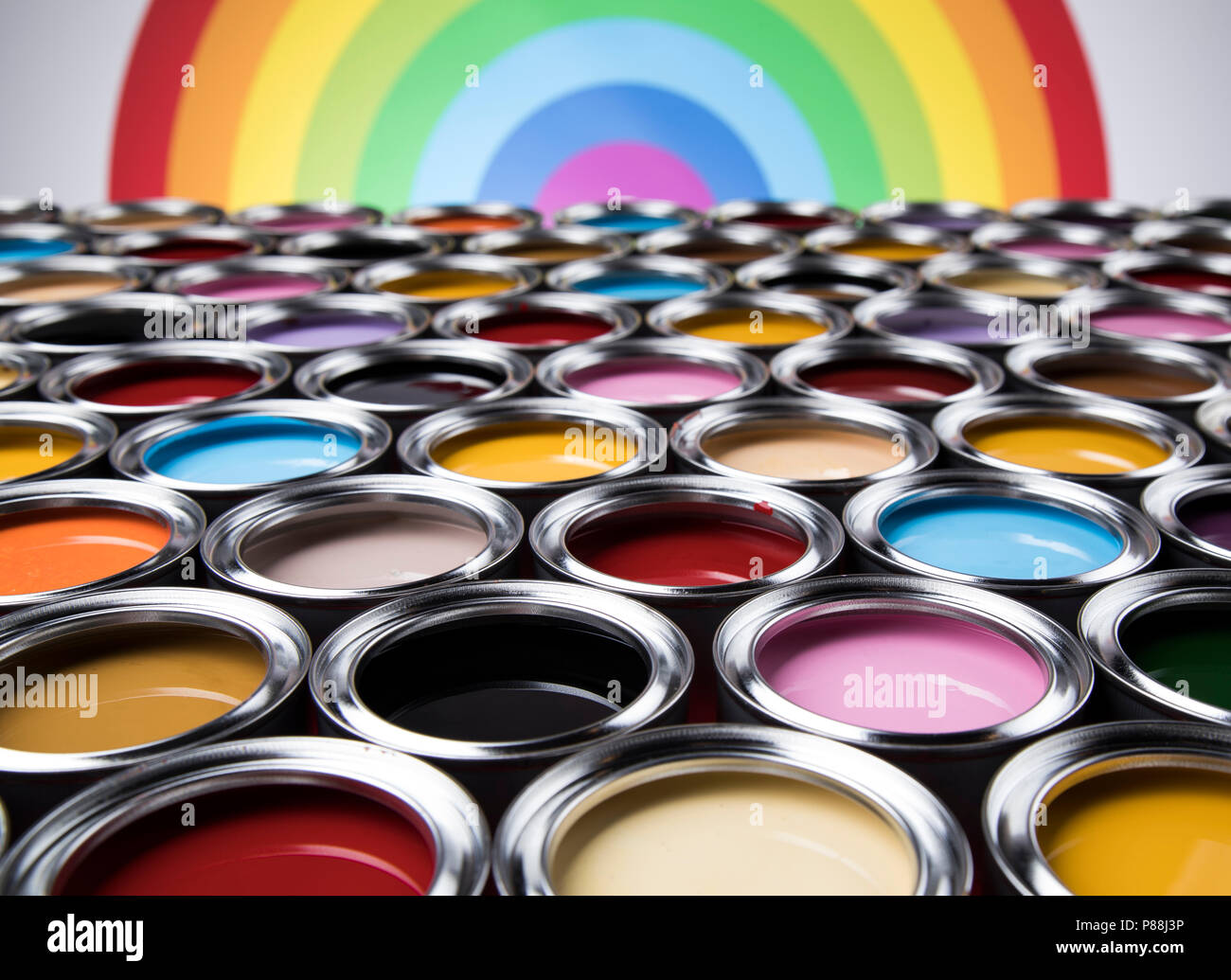 Rainbow colors, Open cans of paint Stock Photo - Alamy
