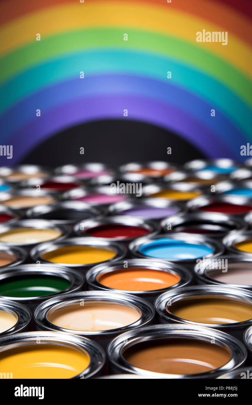 Rainbow colors, Open cans of paint Stock Photo - Alamy