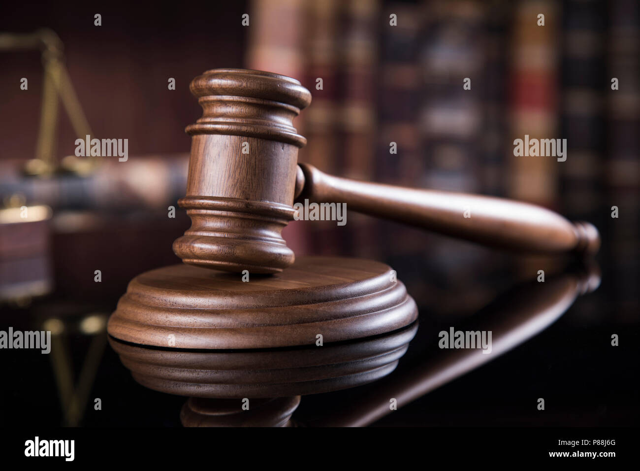 Law theme, mallet of the judge, justice scale, mirror reflection ...