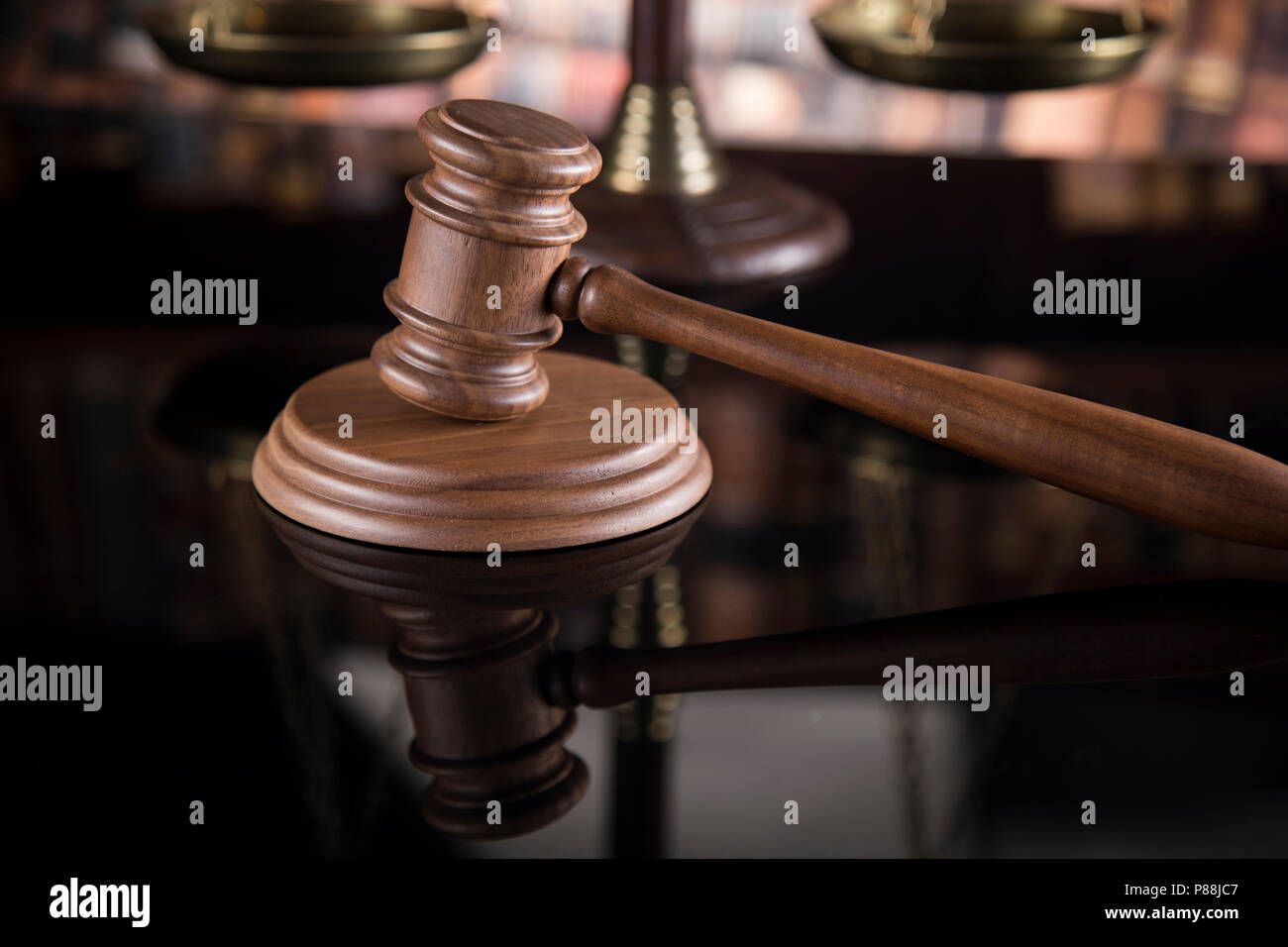 Law theme, mallet of the judge, justice scale, mirror reflection ...