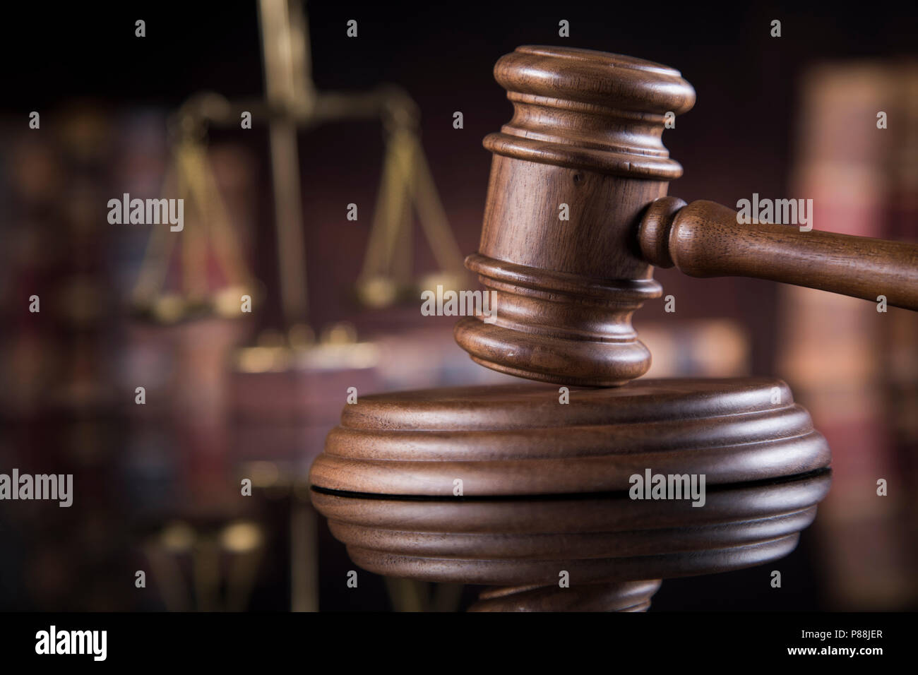 Law theme, mallet of the judge, justice scale, mirror reflection ...