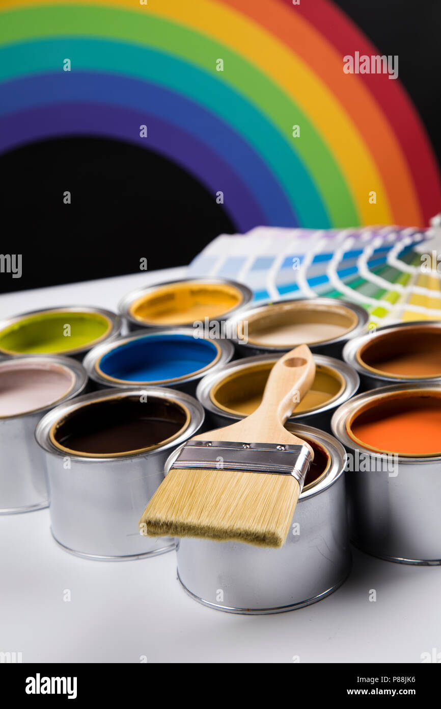 Full Buckets of rainbow colored oil paint Stock Photo - Alamy