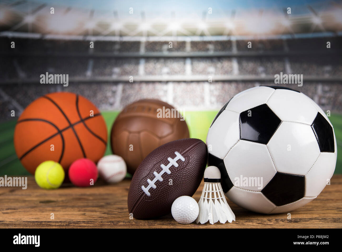 Sport equipment and balls, stadium background Stock Photo - Alamy