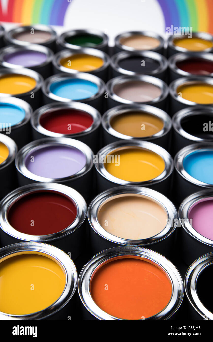 Full Buckets of rainbow colored oil paint Stock Photo - Alamy