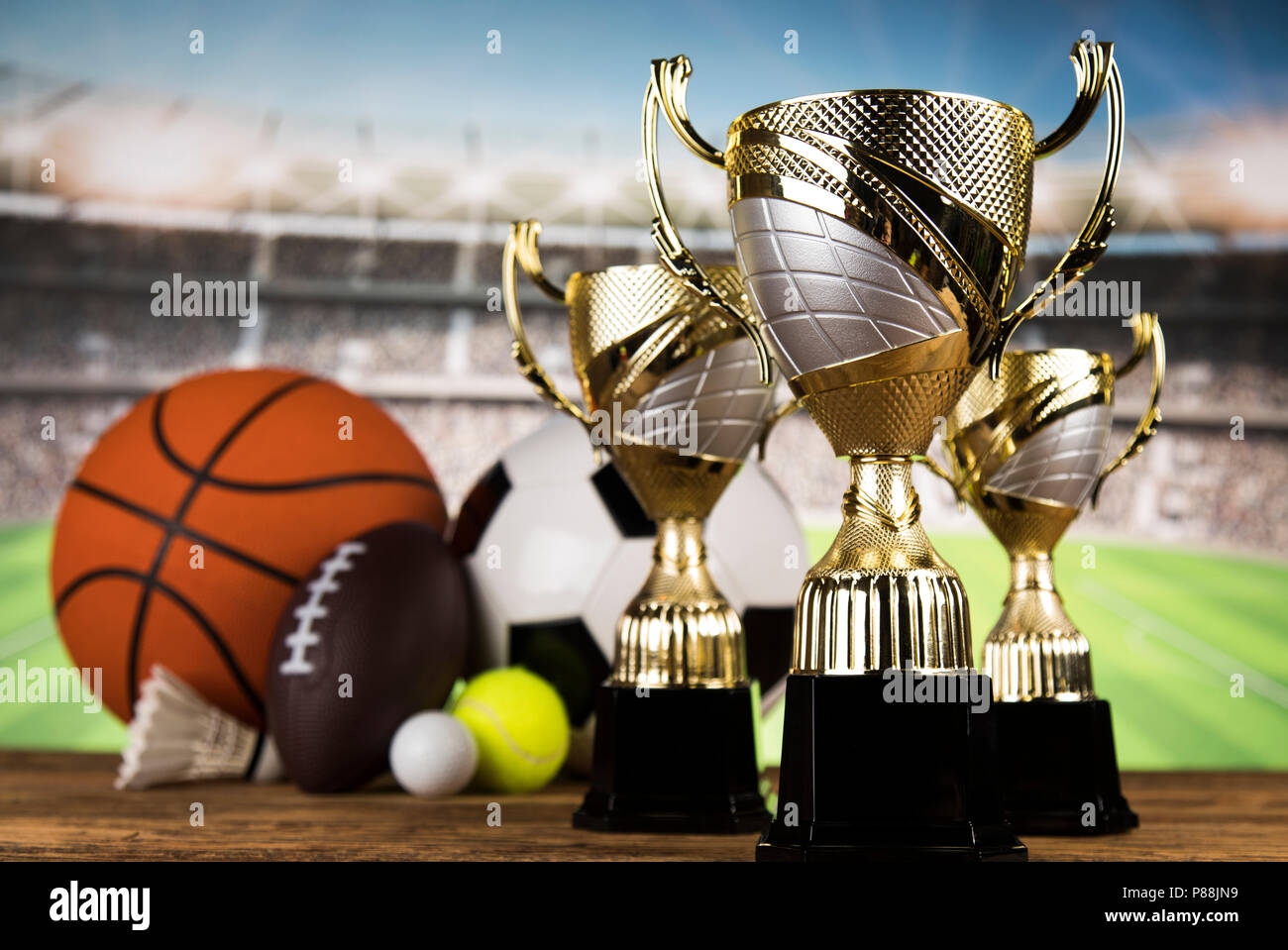 Winning trophy championship award, sport stadium background Stock Photo ...