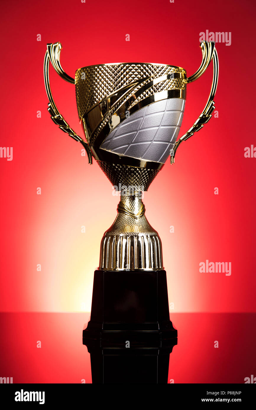 Award winning and championship concept, trophy cup on sport background ...