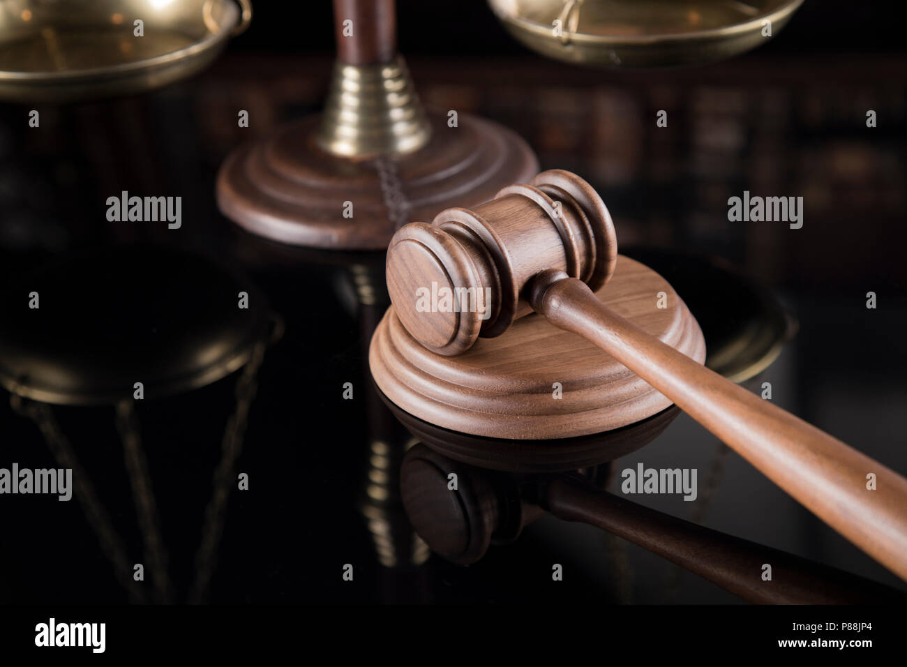 Law theme, mallet of the judge, justice scale, mirror reflection ...