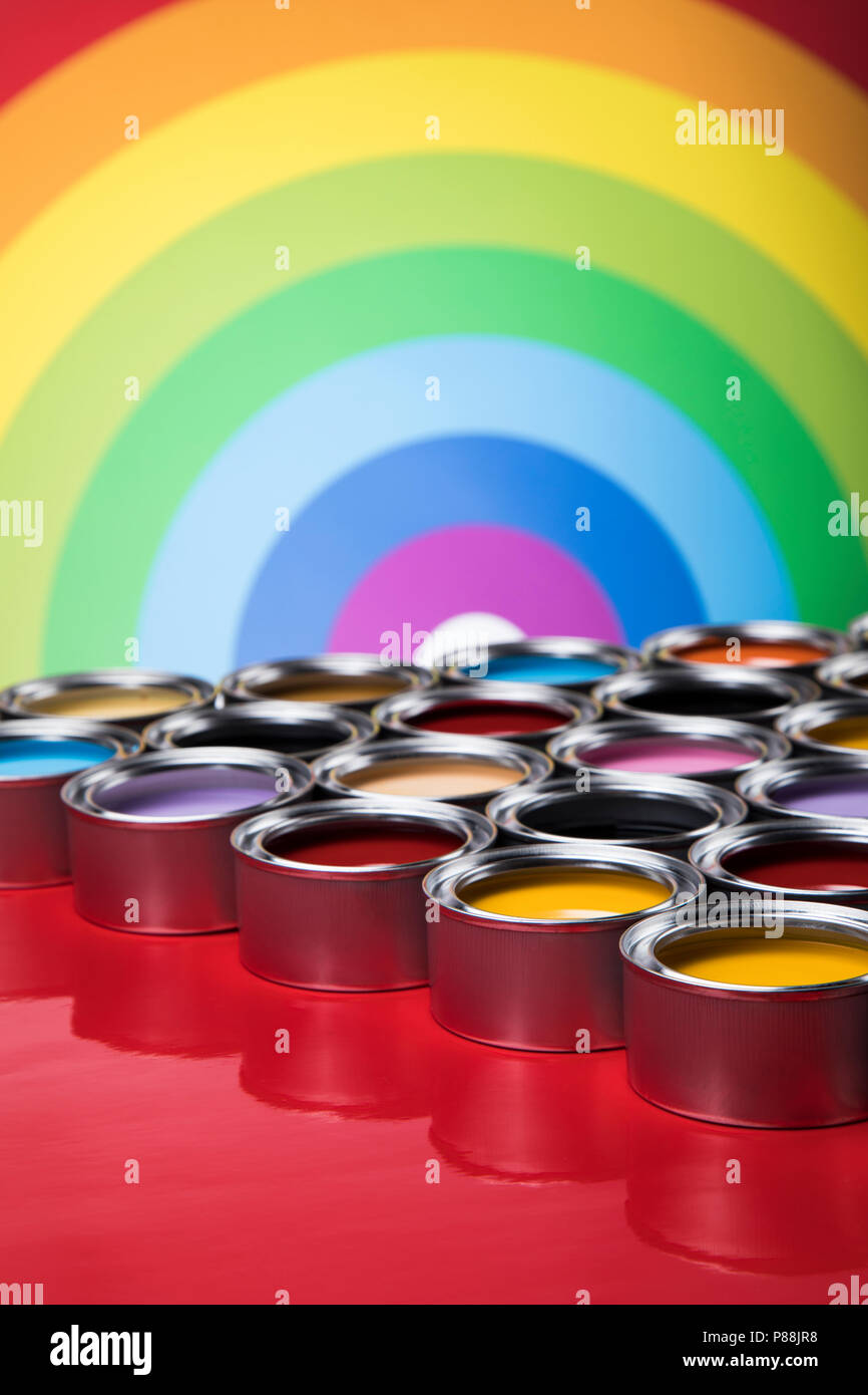 Full Buckets of rainbow colored oil paint Stock Photo - Alamy