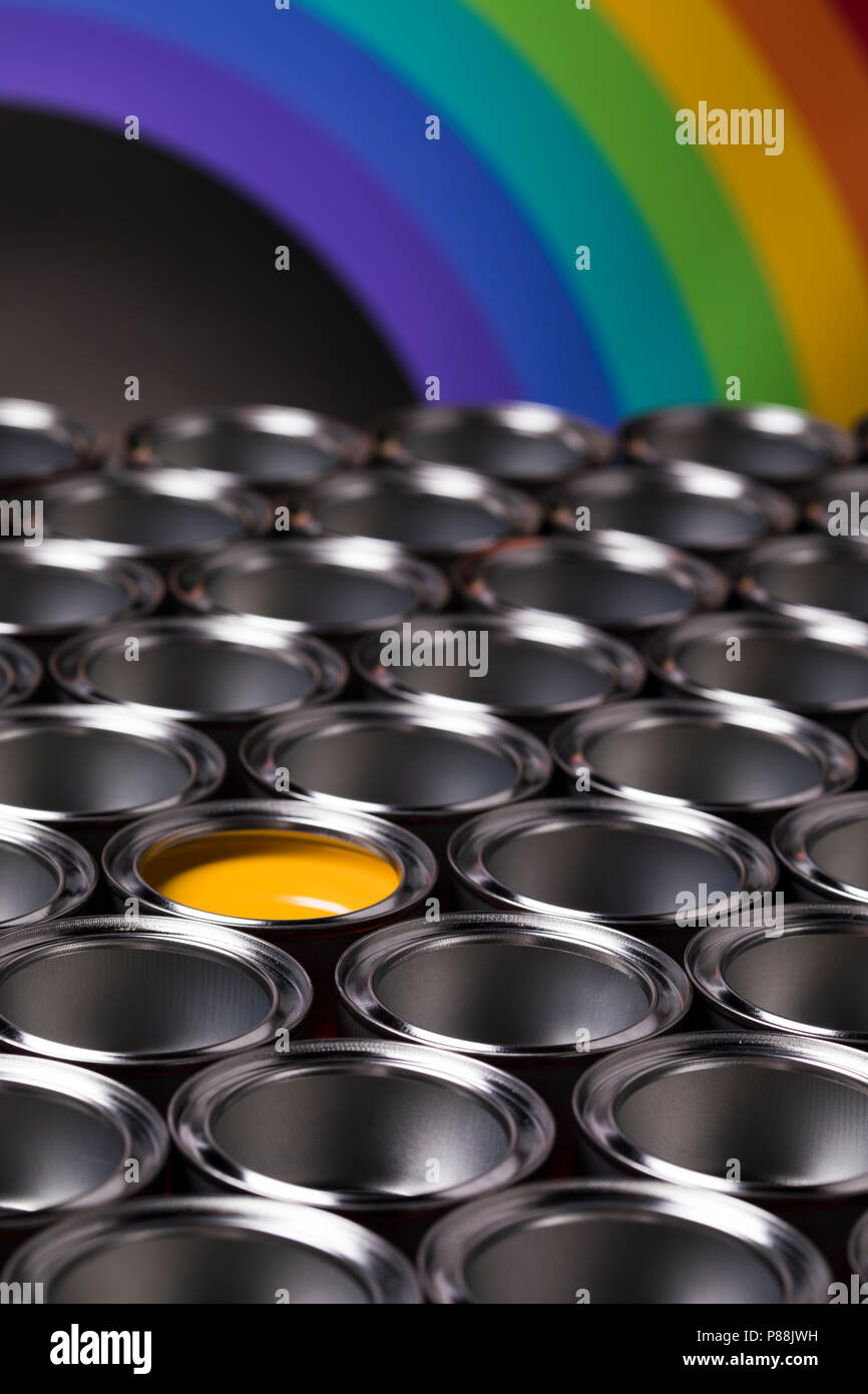 Rainbow colors, Open cans of paint Stock Photo - Alamy