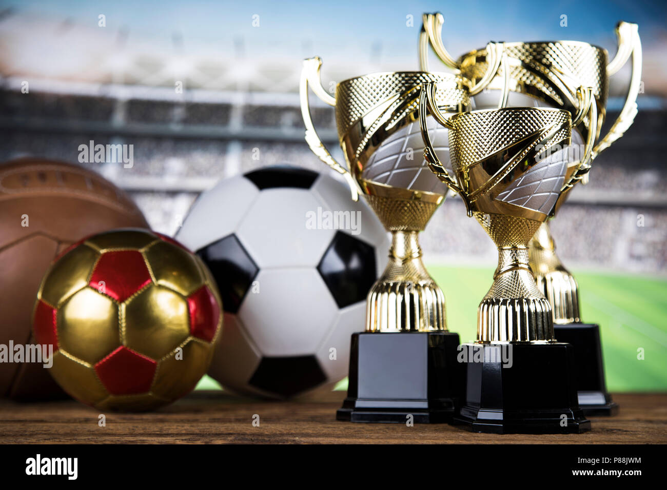 Winning trophy championship award, sport stadium background Stock Photo ...