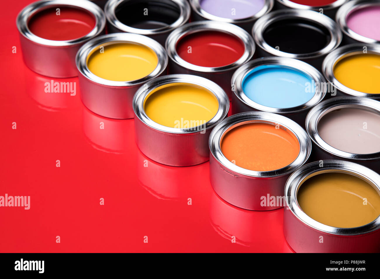 Creativity concept group of tin metal cans with color paint Stock Photo ...