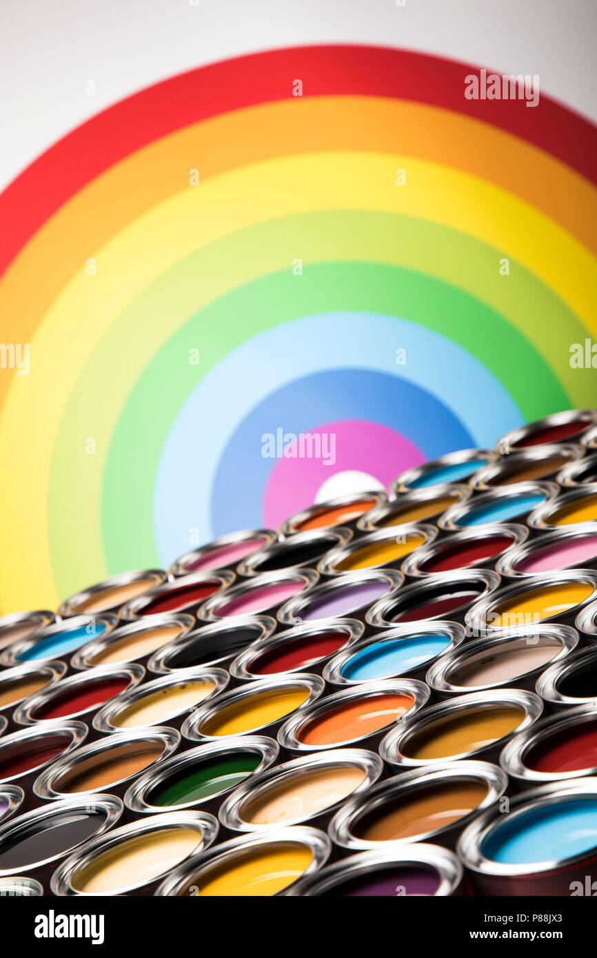 Full Buckets of rainbow colored oil paint Stock Photo - Alamy