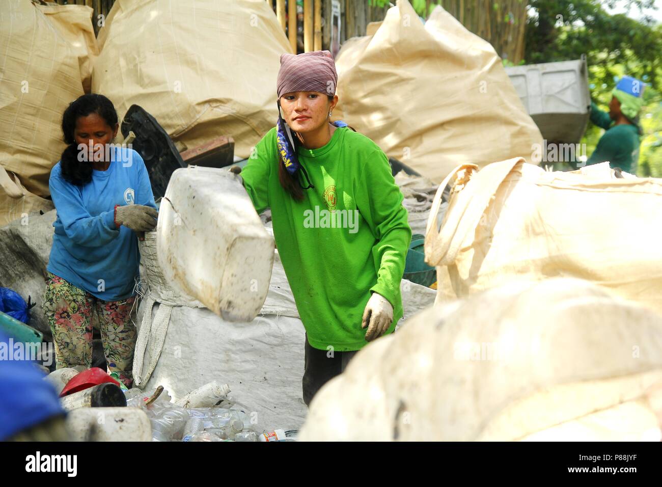 Female junk yard worker hi-res stock photography and images - Alamy