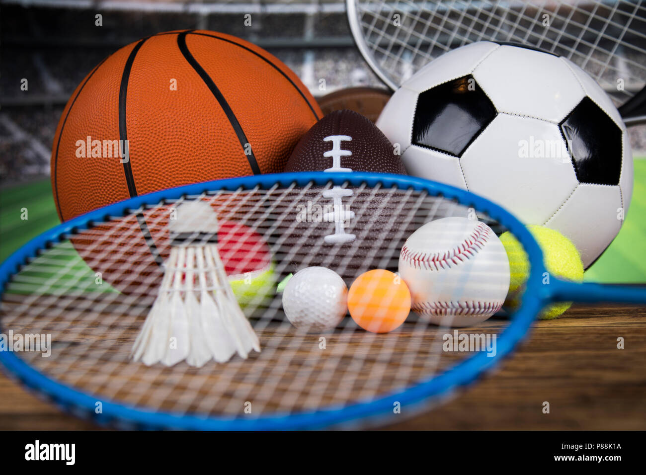 Sport equipment and balls, stadium background Stock Photo - Alamy