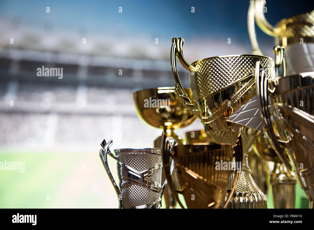 Award winning and championship concept, trophy cup on sport background ...