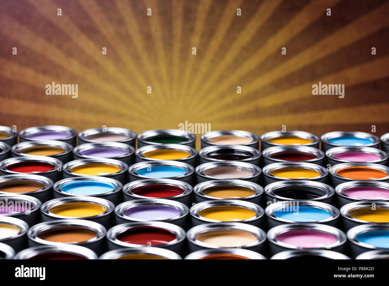 Group of tin metal cans with color paint Stock Photo - Alamy