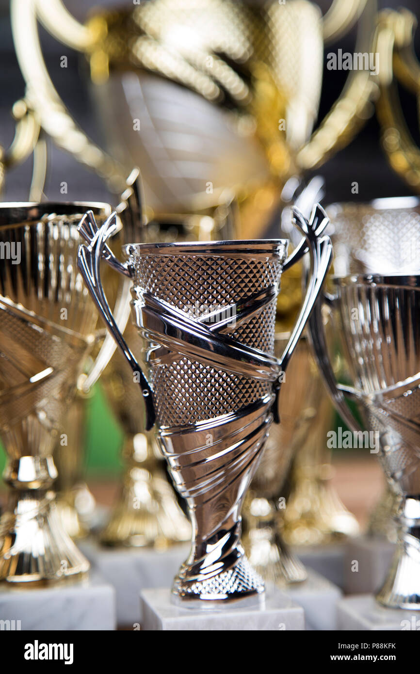 Award winning and championship concept, trophy cup on sport background ...