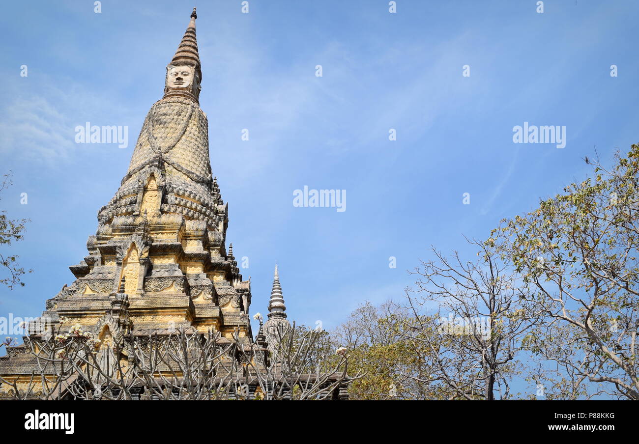 Ancient Buddhist stupas and tombs of Khmer royalty with Buddha face on ...